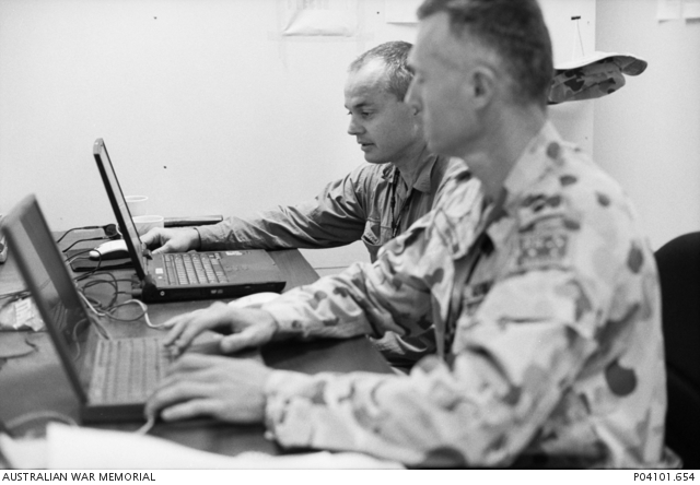 Lieutenant Colonel (Lt Col) Philip Swinburg (foreground), and Andrew ...