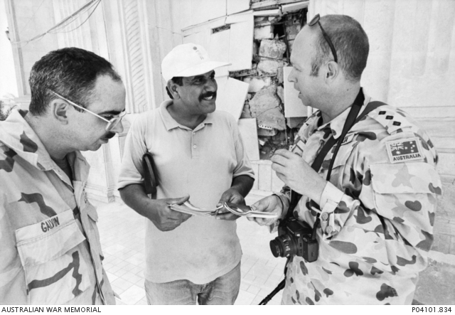 Captain Phil Pyke, an Australian with the Joint Public Affairs Unit ...