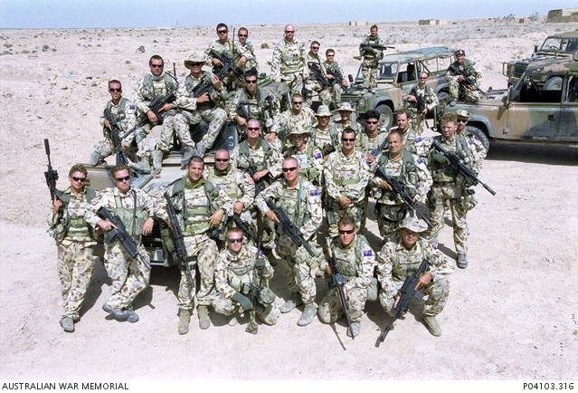 An informal group portrait of Australian Clearance Diving Team 3 ...