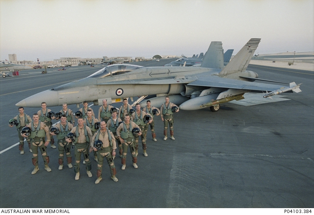 Informal group portrait of members of the air crew from 75 Squadron ...