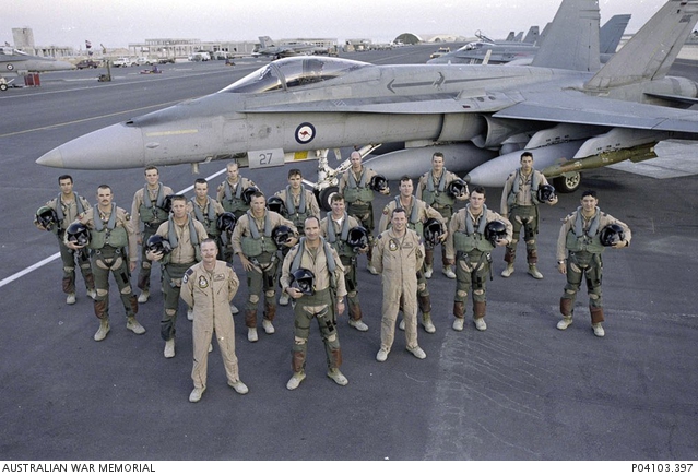 Informal group portrait of members of the air crew from 75 Squadron ...
