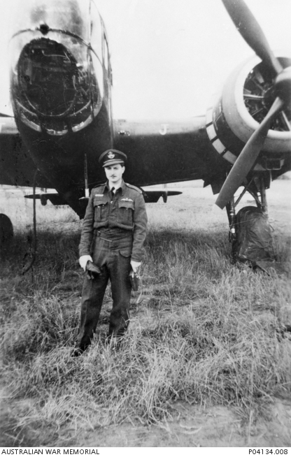 Possibly 401905 Leslie Gordon Anderson, pilot, standing in front of a ...