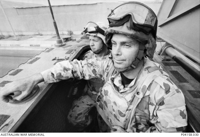 Sergeant (Sgt) Mark Dowling (foreground), Captain (Capt) Phil Pyke ...
