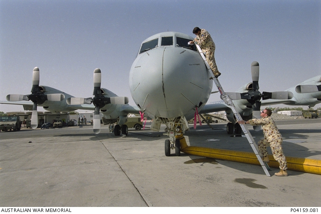 Two ground crew members of the Australian P-3 Orion maritime patrol ...