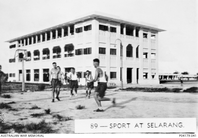 Men, possibly Australian soldiers, playing sport at Selarang ...