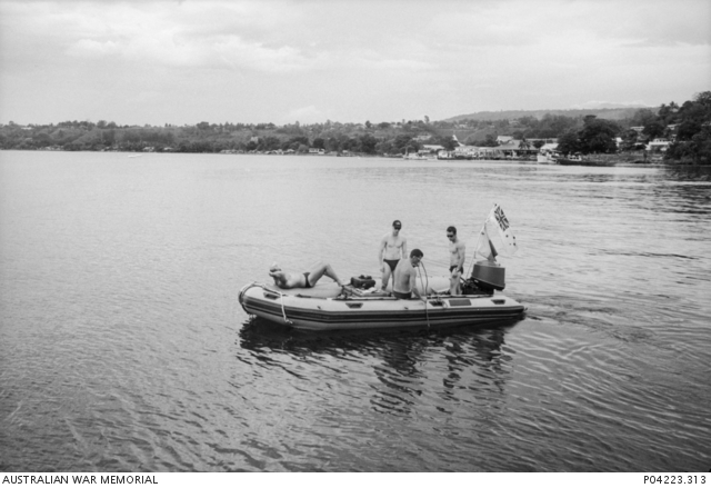 Four Australian naval clearance divers on a Royal Australian Navy ...