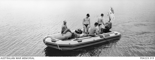 Four Australian naval clearance divers on a Royal Australian Navy ...