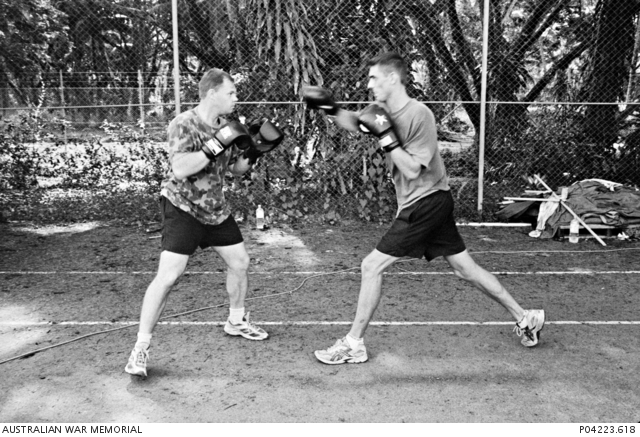 Soldiers boxing as part of Physical Training at Camp RAMSI, the ...