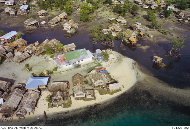 Aerial view of a town on the island of Malaita, taken from an ...