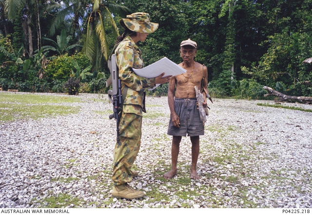 Captain (Capt) Rachel Leal of 1st Intelligence Battalion gives an ...