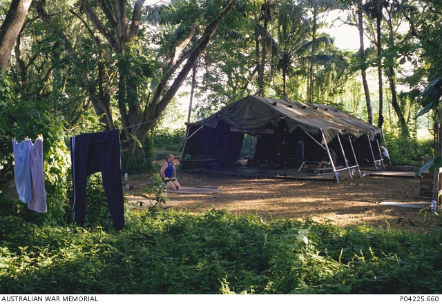 Australian soldiers exercise at a ‘Jungle Gym’, an open-sided tent with ...