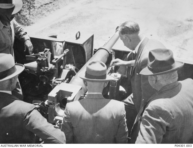 A group of unidentified officials inspecting the interior of the ...