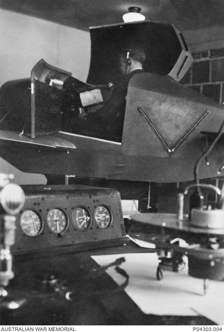 A trainee wireless air gunner undergoing night flight training at No. 4 ...