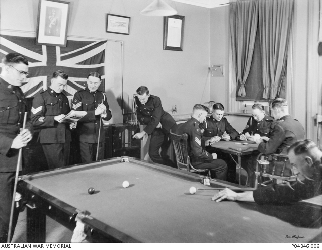 Members of the RAMC Sergeants Mess relax after parade by playing a game ...