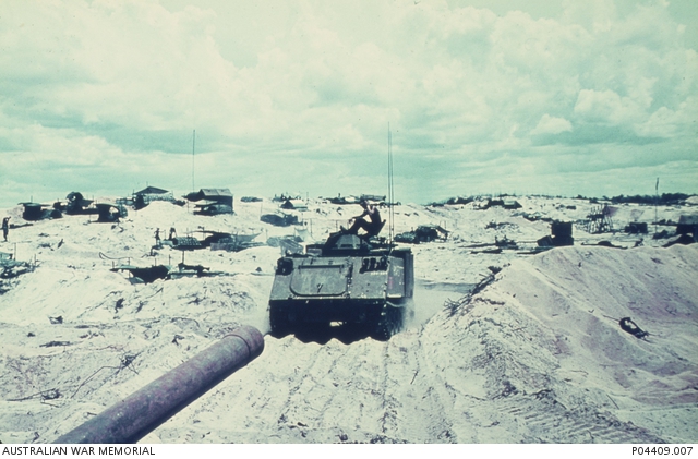 An M113A1 Armoured Personnel Carrier (APC) following a Centurion Mk V/I ...