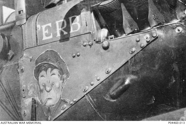 Starboard side view of a British BE2 aircraft displaying nose art ...