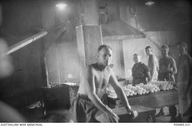 Allied Prisoners of War (POWs) working in the cookhouse in Roberts ...