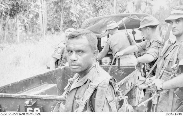 A captured Indonesian infiltrator glares at the camera whilst under the ...