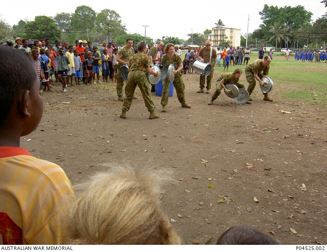 Members of the Australian Army band 'Kapooka' perform using tin rubbish ...