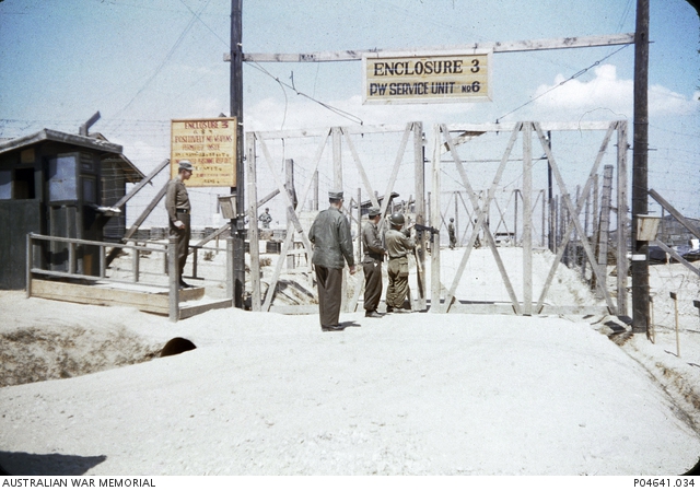 US and Korean guards at the entrance to Nonsan prisoner of war (POW ...