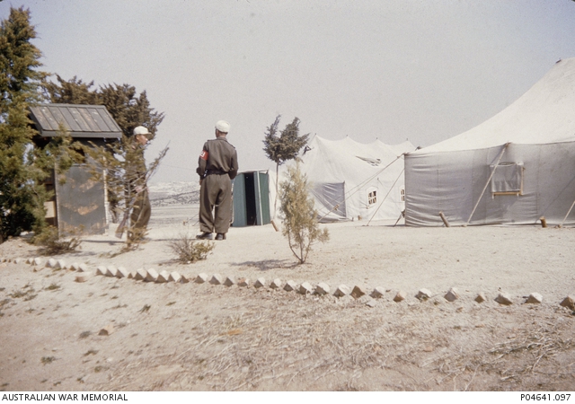 Chinese or North Korean soldiers guarding the entrance to their area of ...
