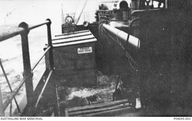 A sign attached to the side of a deck house aboard HMAT Beltana ...