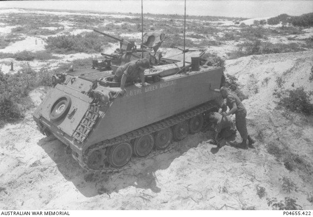 Near Night Defensive Position (NDP) Brigid, two crew members of an ...