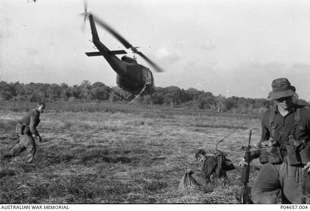 Members of 11 Platoon, D Company, 6RAR, loaded a seriously wounded ...