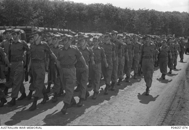 A rifle company of 7RAR marches towards Luscombe Field where a parade ...