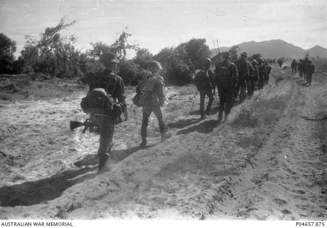 Wearing floppy bush hats, members of D Company, 6RAR/NZ (ANZAC ...