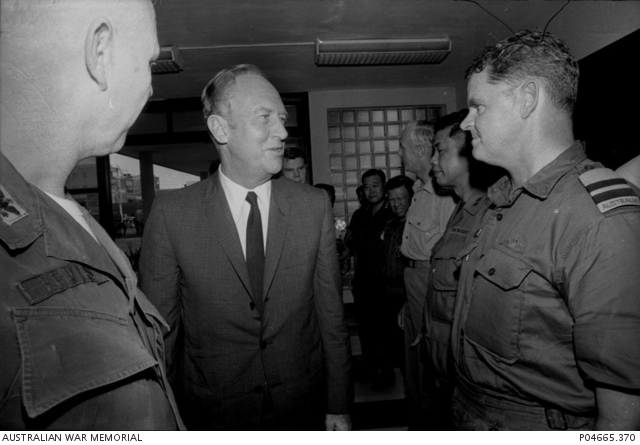 US Secretary of State, William P. Rogers (centre), is introduced to ...