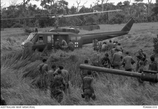 Australian soldiers load stretcher casualties onto a US Army medical ...