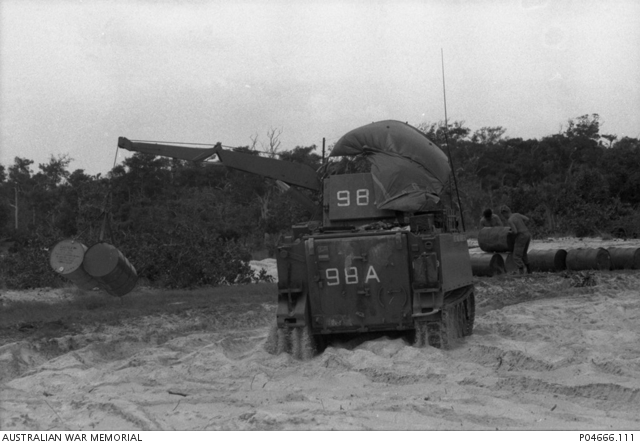 An M113A1 Repair Fitters Vehicle from 3 Cavalry Regiment uses its HIAB ...