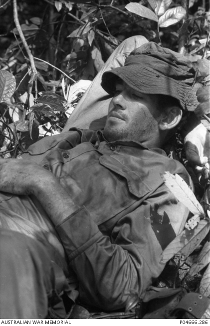 An unidentified member of B Company, 9RAR, has a quick snooze during a ...