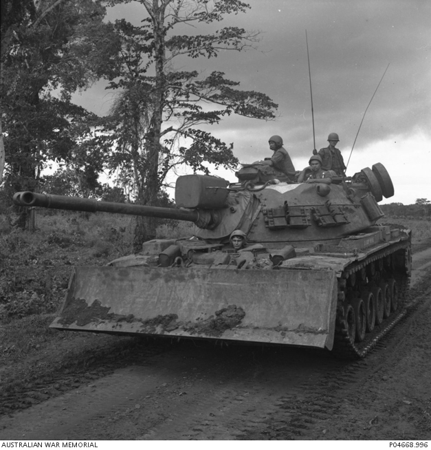 Part of an enormous column of armoured vehicles, an M48A3 tank with ...