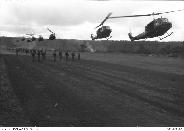A line of RAAF UH-1 Iroquois ('Huey') helicopters takes off from ...