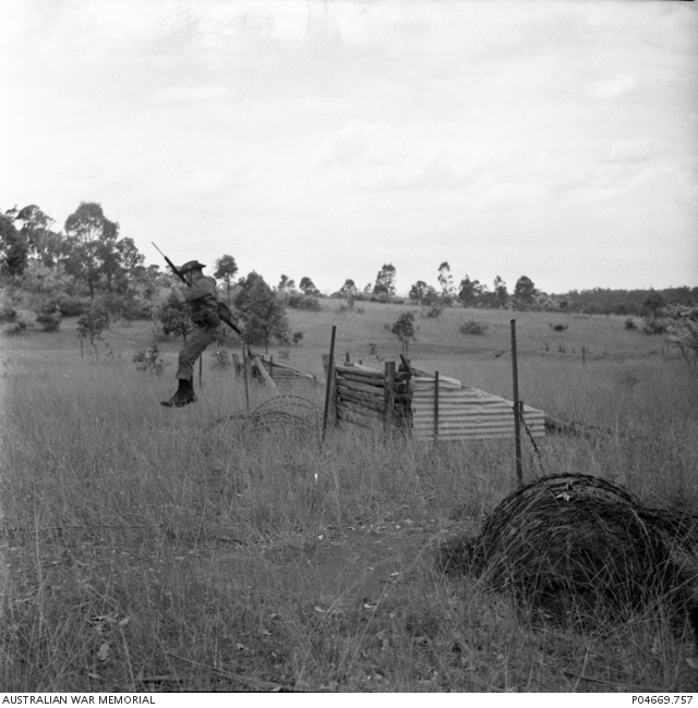 With his rifle in hand, a trainee at the Australian Army's Infantry ...