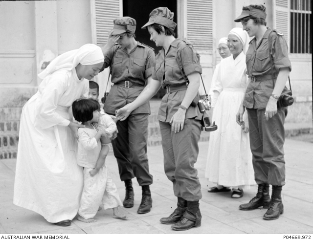 Three of the 'Fab 4' nurses with nuns at a children's orphanage ...