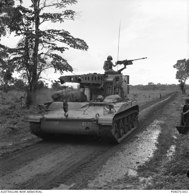 Part of an enormous column of armoured vehicles, an M578 Light Armoured ...