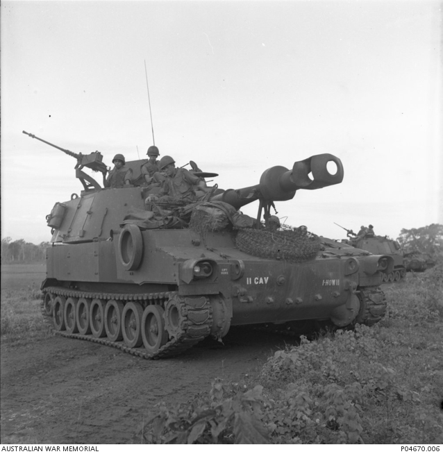 Part of an enormous column of armoured vehicles, an M109 Self Propelled ...