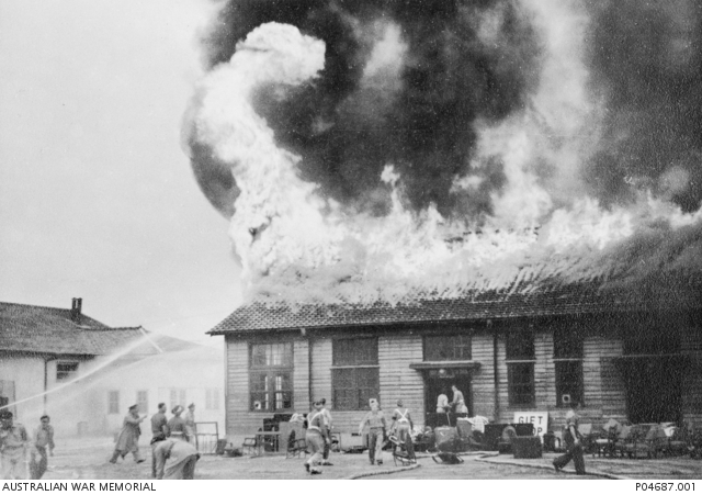 Soldiers attempting to put out the blaze at the Anzac Club, fierce ...