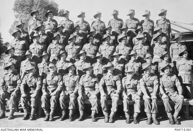 Group portrait of a group of men serving with the Australian Army ...