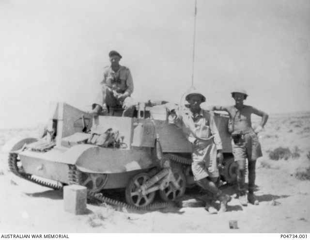 An officer and two soldiers, all unidentified, probably of the 9th ...