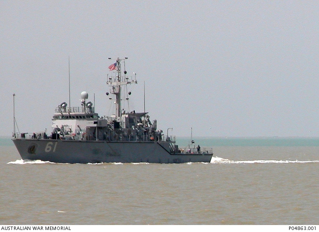 USS Raven mine sweeping. One of a series of photographs taken by ...
