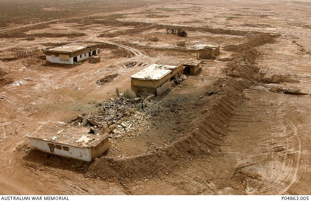 Aerial view of ruined buildings at Al Faw Peninsula. One of a series of ...