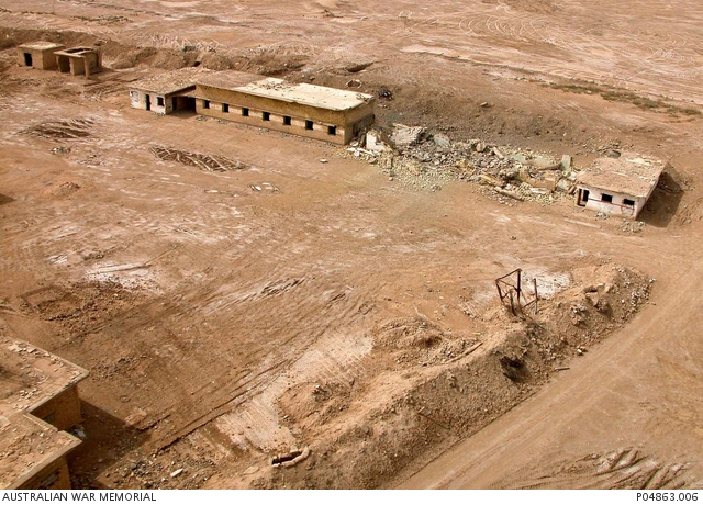 Aerial view of ruined buildings at Al Faw Peninsula. One of a series of ...