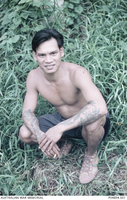 Informal portrait of Buntu Anak Tutom, an Iban (also known as Sea Dyak ...