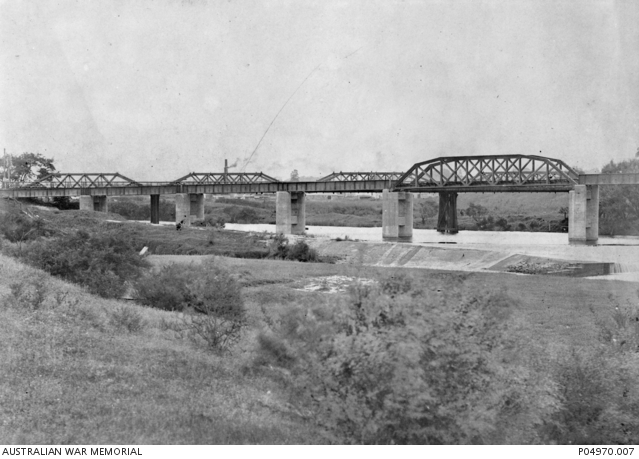 The railway bridge over the weir near the Georges River outside ...