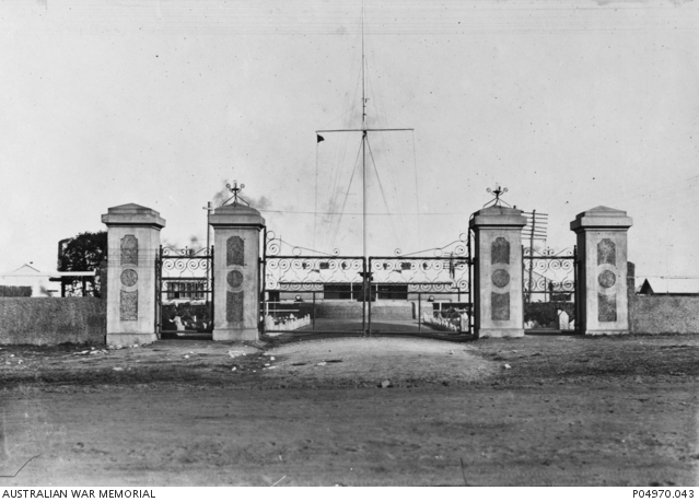 The front gates at the Liverpool Camp. The gates are decorated with ...