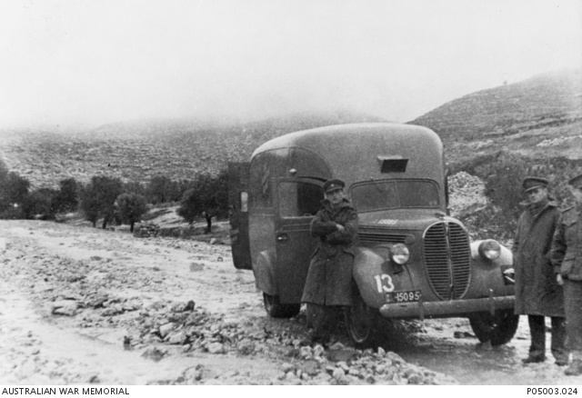 Three unidentified Salvation Army Chaplains stand next to their 1939 ...